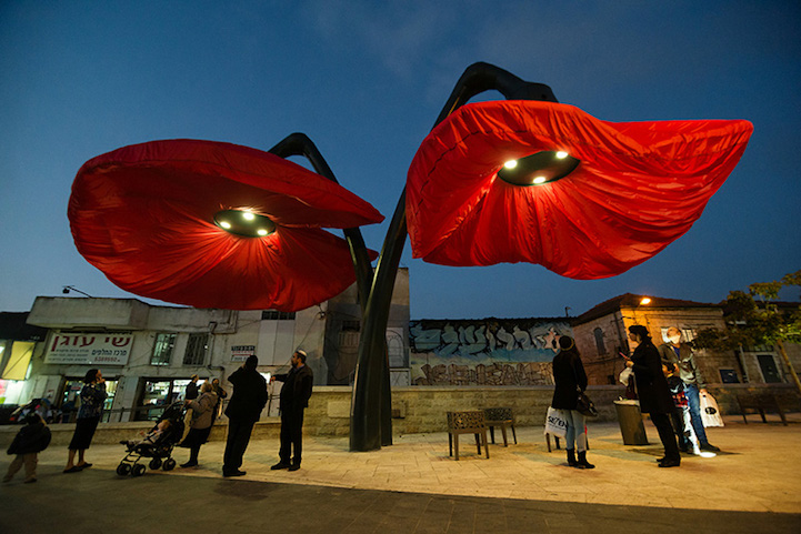 These Giant Urban Flowers Bloom When Pedestrians Walk Under Them | artFido